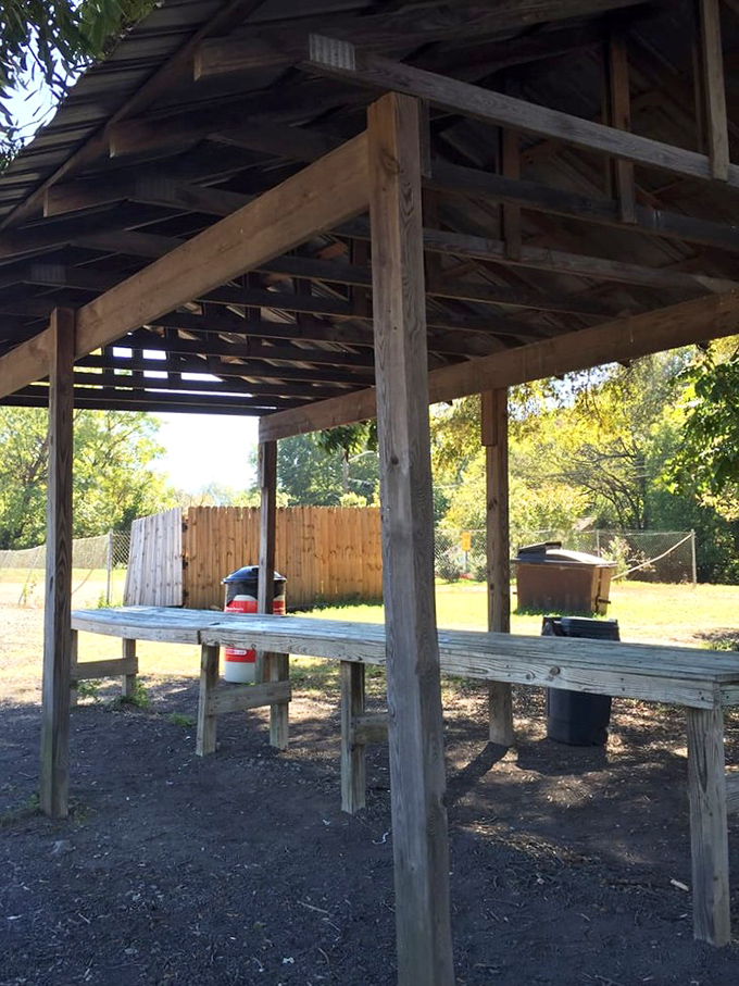 Al fresco dining, Brooks' style. This rustic covered bench offers shelter from sun and rain while you commune with burger greatness.