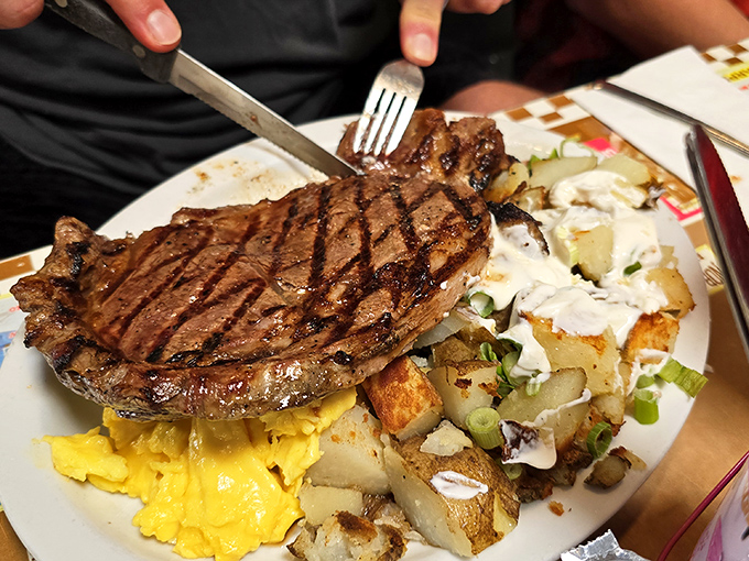 That steak isn't just cooked&mdash;it's been treated with the respect a good piece of beef deserves, sharing the spotlight with eggs and potatoes.