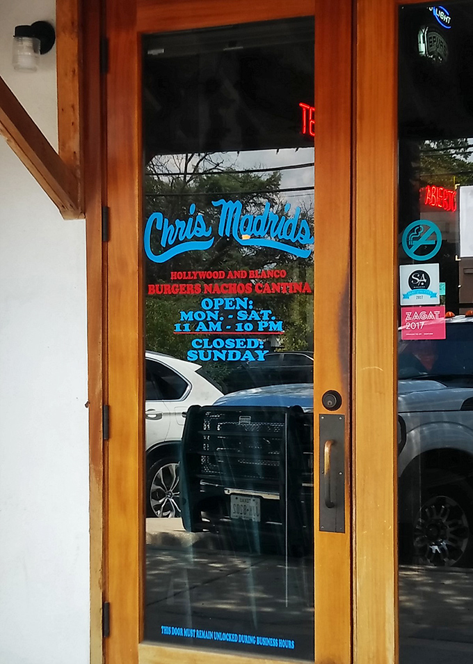 Business hours posted clearly – important information for planning your burger pilgrimage with military precision.