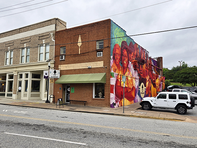 The vibrant mural celebrates Macon's musical heritage, a colorful backdrop to the soulful flavors waiting inside this brick cornerstone.