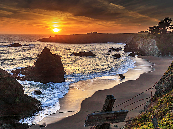 Sunset paints the Pacific with colors no filter could improve. This is the moment California tourism photos are trying to capture.