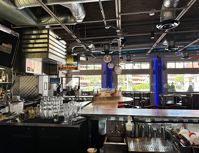 A bar that strikes the perfect balance between "I'm on vacation" and "I have excellent taste." Exposed brick meets polished service.