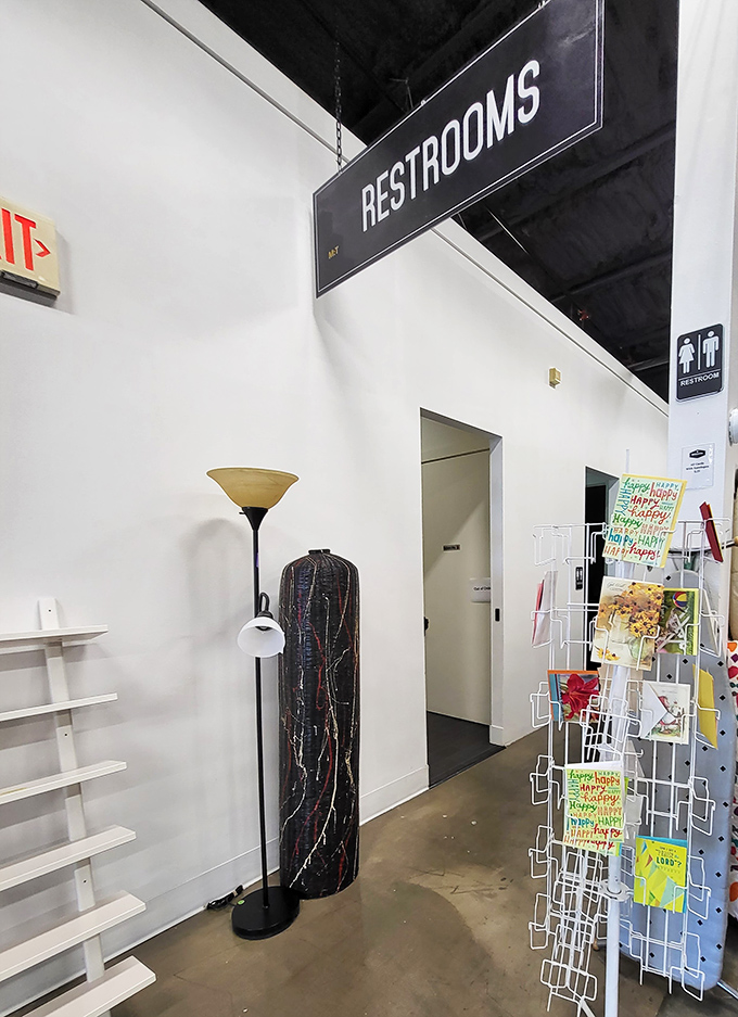 Even the path to the restrooms offers shopping opportunities&mdash;proof that at Mission Thrift, no square footage goes to waste.