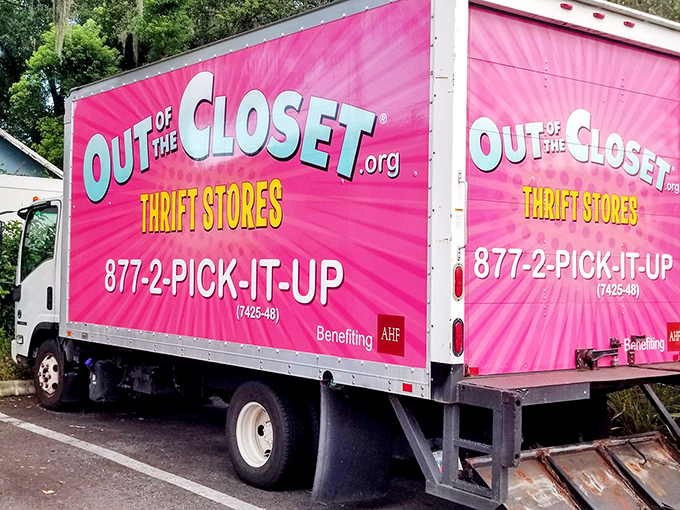 The pink pickup truck: rolling proof that even the donation process can have personality and purpose.