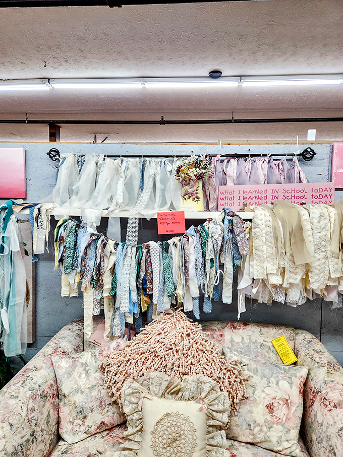 Fabric treasures hang like delicate flags of surrender to vintage style, each piece telling stories of homes long ago.