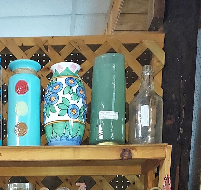 Colorful vases stand at attention, their mid-century designs and bold turquoise hues practically screaming "Mad Men dinner party centerpiece."
