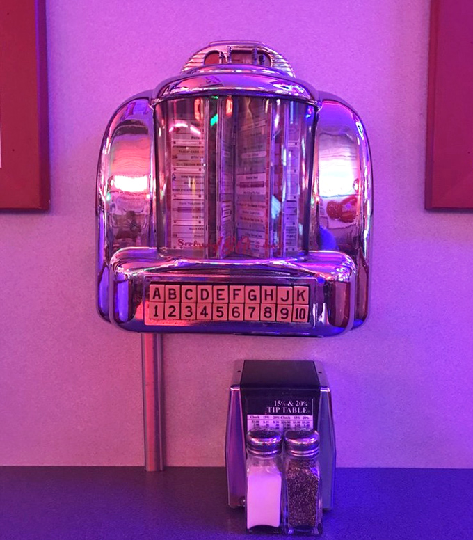 This isn't just decoration&mdash;this vintage Seeburg wallbox still lets you pick your soundtrack while waiting for your pizza sub.