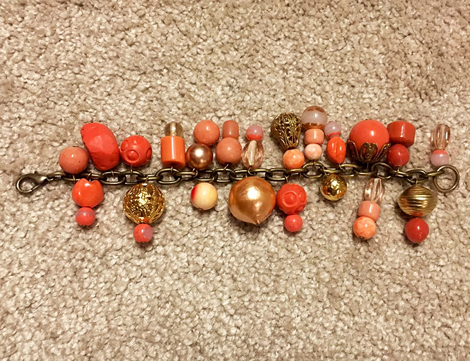 A vintage bracelet that carries decades of stories in its coral beads. Someone once loved this&mdash;and someone new will again.