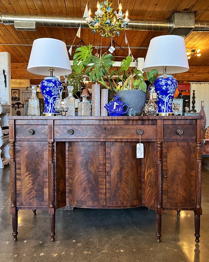 This isn't just a sideboard&mdash;it's functional art. The rich mahogany finish and classic lines would make even Marie Antoinette jealous.