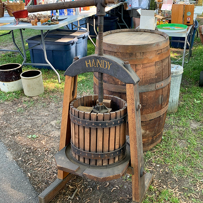 This antique wine press isn't just farm equipment—it's functional history. Grandpa would recognize it; hipster breweries would covet it.