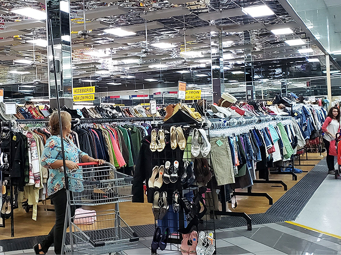 Serious shoppers navigate the aisles with purpose, their carts ready for that "can't believe I found this" moment.