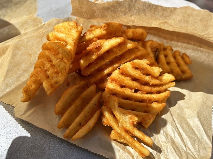 Waffle fries: the superior form of potato. Their geometric perfection creates more surface area for that golden crispiness we all secretly crave.