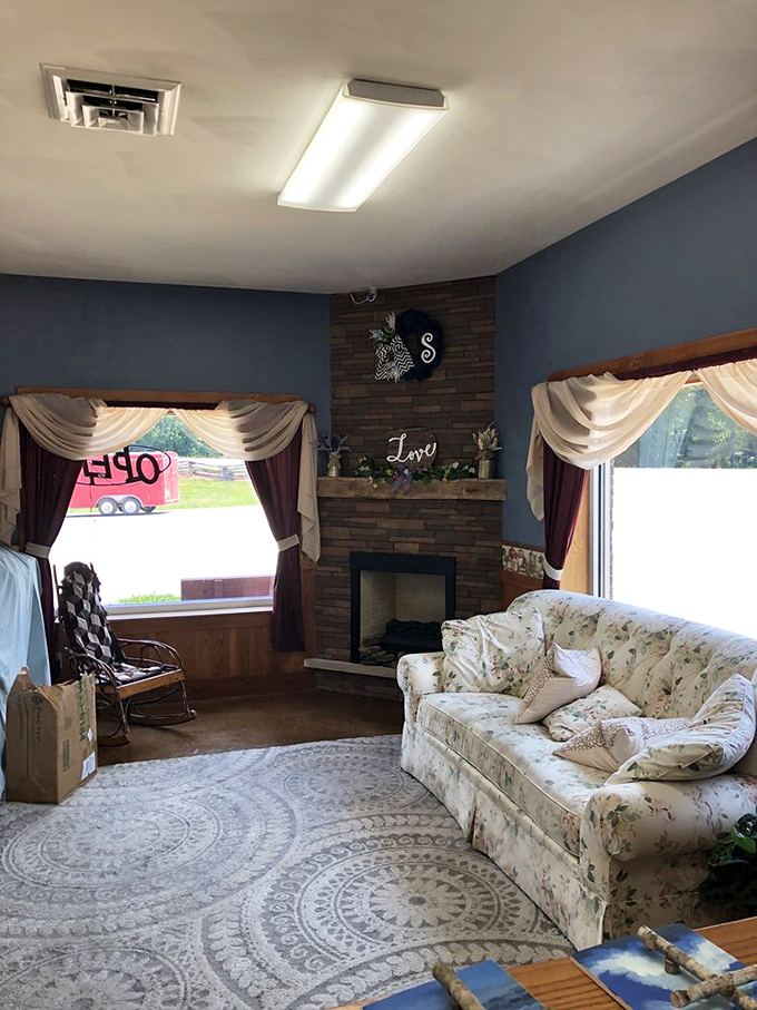 The waiting area's stone fireplace and floral couch whisper, "Stay awhile," even before you've tasted a single bite.
