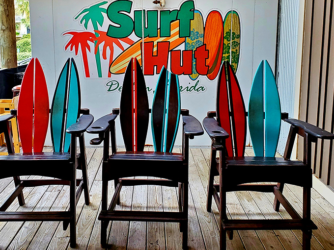 Adirondack chairs shaped like surfboards&mdash;because regular chairs weren't beachy enough. The perfect spot to contemplate life while waiting for your table.