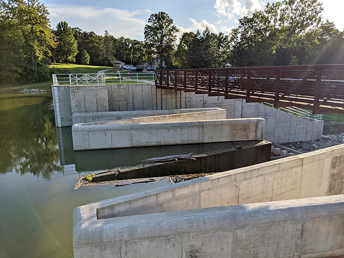 The spillway combines practical water management with unexpected beauty&mdash;engineering that's been quietly doing its job for decades.