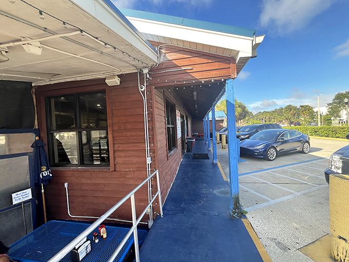 The blue-trimmed entrance isn't rolling out a red carpet, just a straightforward path to seafood nirvana.