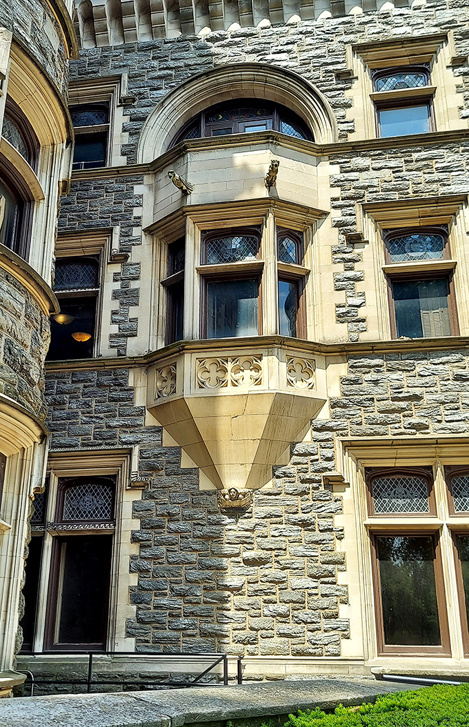 The castle's bay windows and stone detailing create a perfect harmony of textures. Medieval inspiration meets American craftsmanship in every carefully placed stone.