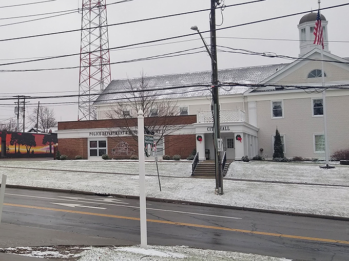 Chardon's classic white city hall stands proudly against a winter sky in Ohio's snowiest county, ready for another blanket of white.