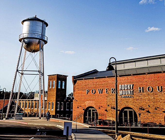 The Rocky Mount Mills complex blends industrial history with modern purpose. That water tower has watched over generations of change.