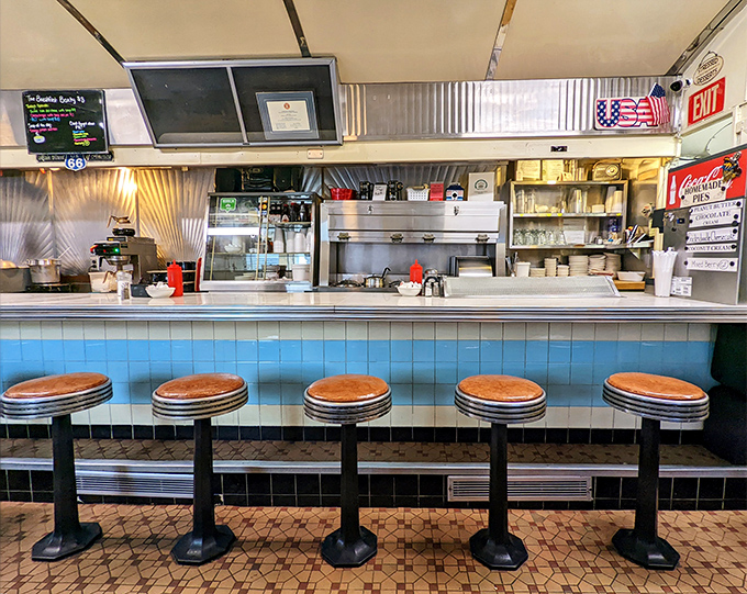 The counter view&mdash;where solo diners become regulars, and regulars become family. Blue tile never looked so inviting.