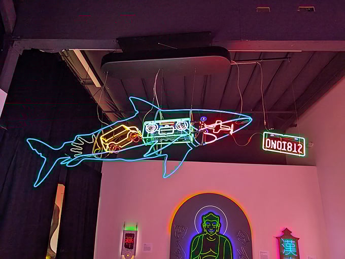 Just when you thought it was safe to visit a museum&mdash;this neon shark swims through air instead of water, hunting for amazed expressions.