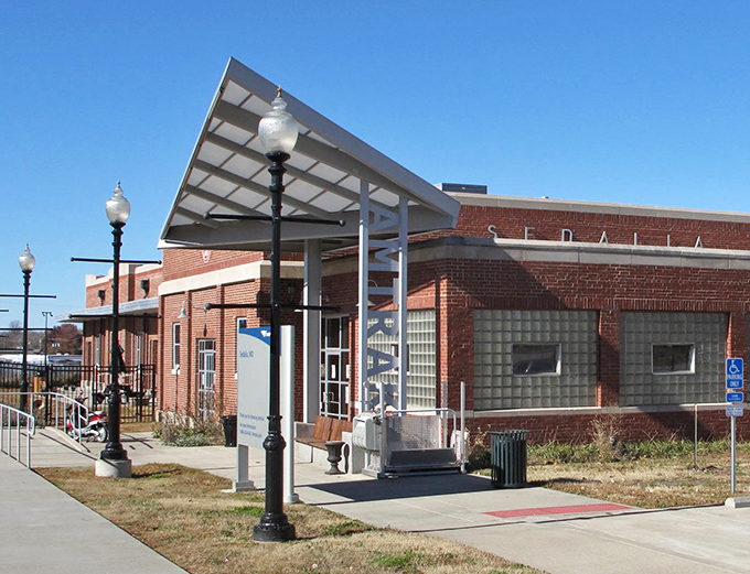 Sedalia's Amtrak Station welcomes travelers with architectural hospitality – a brick-and-mortar "howdy" to visitors arriving by rail.