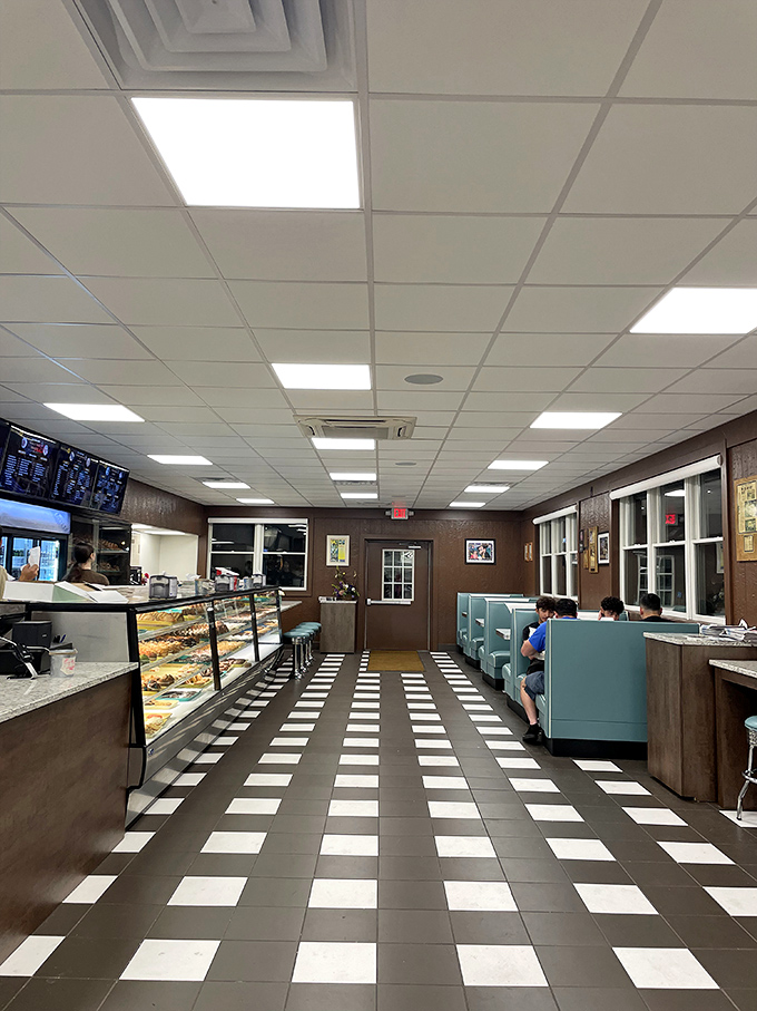 The checkered floor leads the eye straight to the display case &ndash; a yellow brick road for grown-ups with better rewards than Oz.