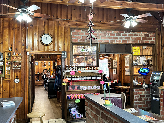 Ceiling fans lazily spin above wood-paneled walls lined with local memorabilia. The perfect setting for serious comfort food consumption.