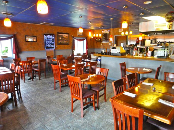 The dining room waits patiently for the dinner rush&mdash;each chair ready to support the weight of your impending food happiness.