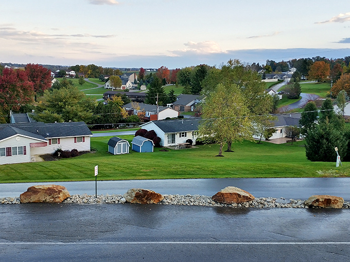 Autumn in Berlin paints the landscape in nature's most vibrant palette. The rolling hills and scattered homes create a peaceful tableau worth framing.