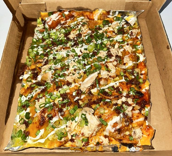 BBQ nachos that defy gravity with their generous toppings. A perfect fusion dish that proves barbecue plays well with others.