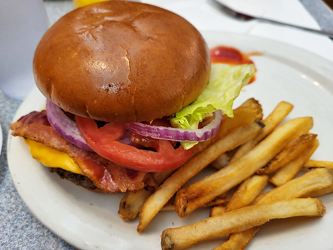 A burger that requires both hands and several napkins &ndash; the universal sign of something worth every messy bite.