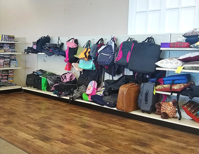 Bag lady heaven! From vintage leather suitcases to modern backpacks, your next travel companion waits patiently on these shelves.