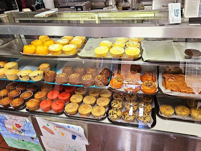 The pastry case at Nat's &ndash; a glass-enclosed museum of muffins, cinnamon rolls, and other baked treasures that make waiting for a table almost bearable.