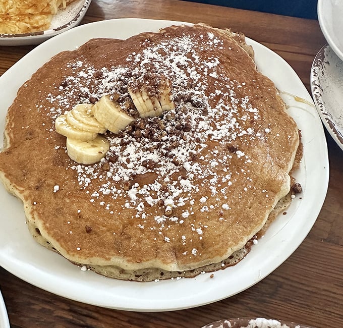 These pancakes don't just include banana&mdash;they celebrate it with a dusting of powdered sugar like fresh snow on a Texas morning.