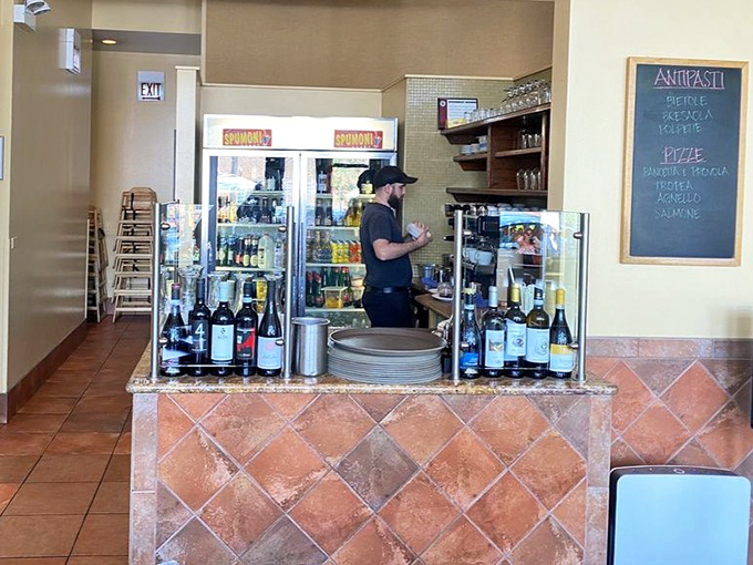 The bar area promises Italian wines that pair perfectly with pizza. Forget beer&mdash;this is how grown-ups do pizza night.