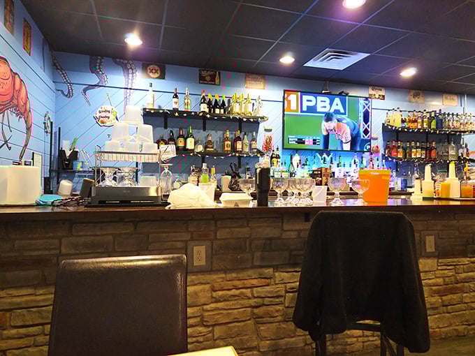 The well-stocked bar promises libations to complement your seafood feast. Because nothing pairs with crab legs like a cold one.