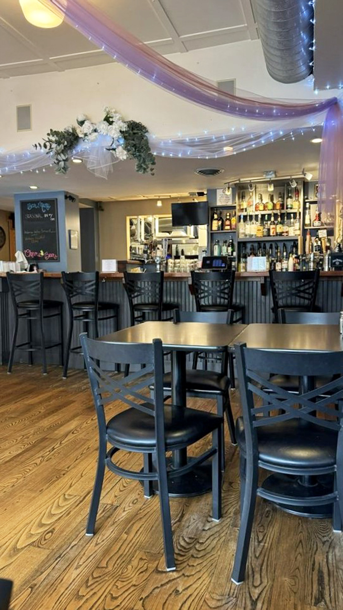 Bar seating perfect for solo diners or couples who want front-row seats to the kitchen action.