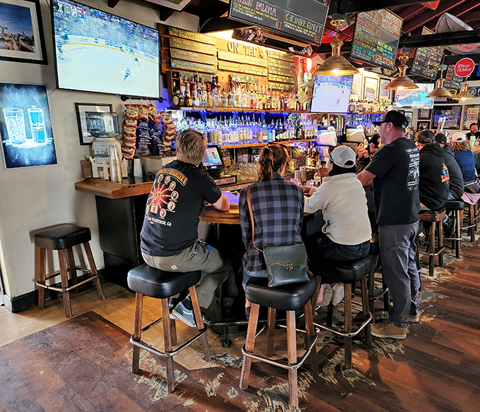 Where locals perch to share the day's events and visitors come to absorb coastal wisdom. The bar stools have heard it all.