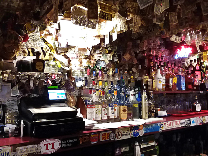 Money on the ceiling, memories on the walls&mdash;this bar area has absorbed decades of laughter, stories, and the occasional spilled beer.
