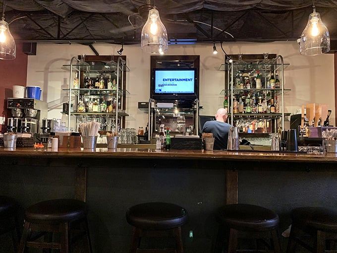 The bar area promises adult beverages that make waiting for a table less of a chore and more of a pre-breakfast social hour.