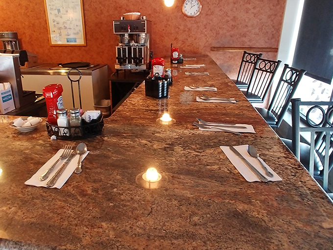 The counter seating&mdash;where solo diners become regulars, coffee flows freely, and the best local gossip is exchanged over perfectly set place settings.