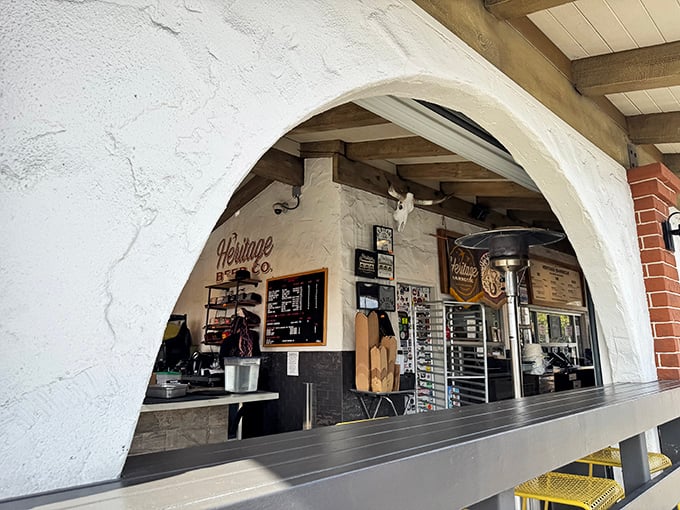 Peek through the archway into barbecue paradise. The rustic-meets-modern aesthetic perfectly frames the serious business happening inside.