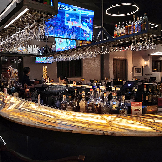 This illuminated bar top glows like Arizona amber, with enough bottles behind it to make even your toughest day dissolve.