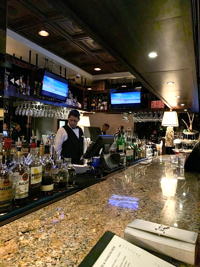 Bartenders at Billy's mix drinks with the precision of scientists and the flair of Broadway performers. The granite bar has heard all the fish stories.