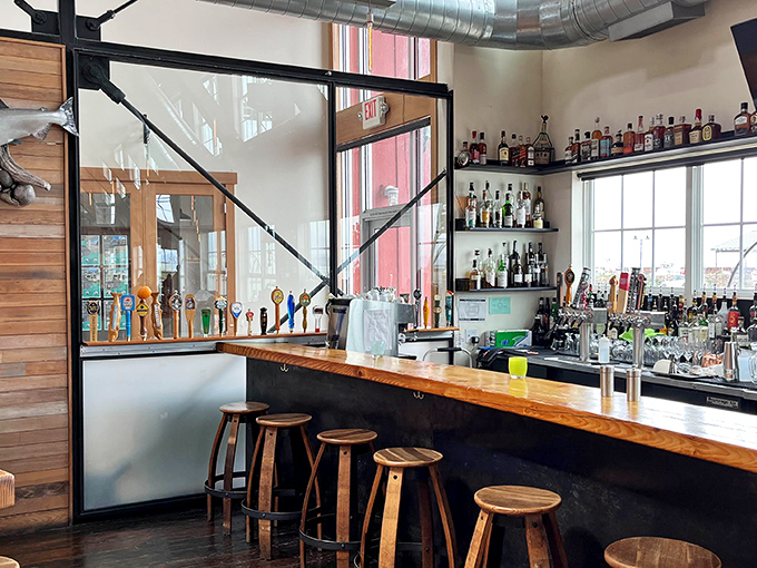 This bar doesn't just serve drinks; it showcases Pacific Northwest spirits with the reverence of a museum curator handling precious artifacts. 