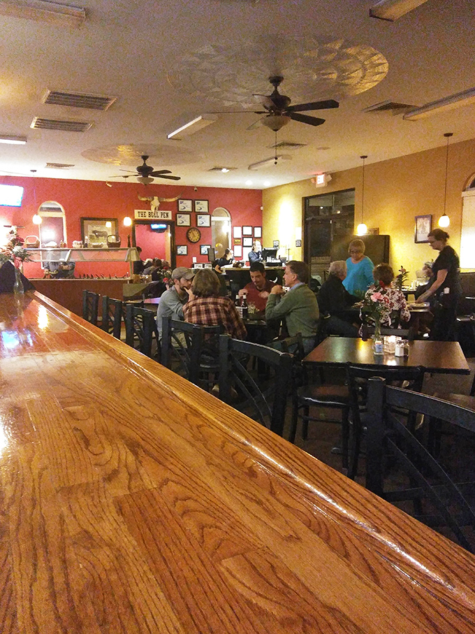 The polished wood bar invites you to settle in, where regulars and newcomers alike find common ground over good drinks.