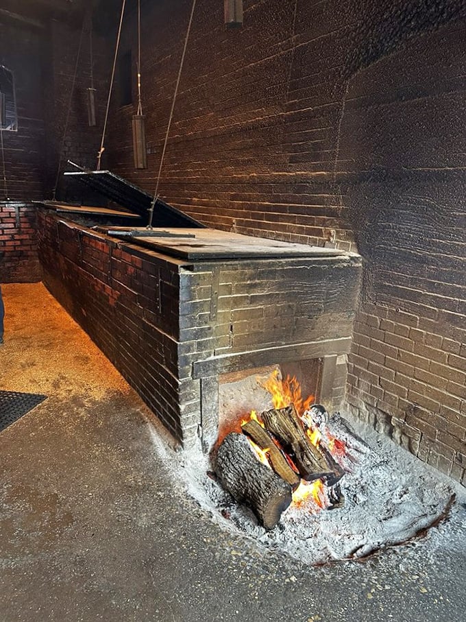 These ancient brick pits have been smoking perfection longer than most restaurants have existed.