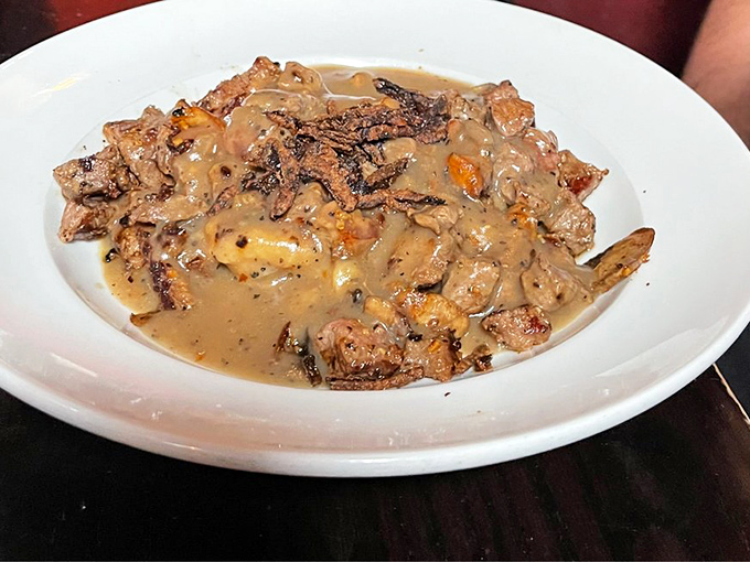 Beef tips swimming in gravy so good you'll want to request a straw. This bowl doesn't just satisfy hunger&mdash;it creates happiness. 