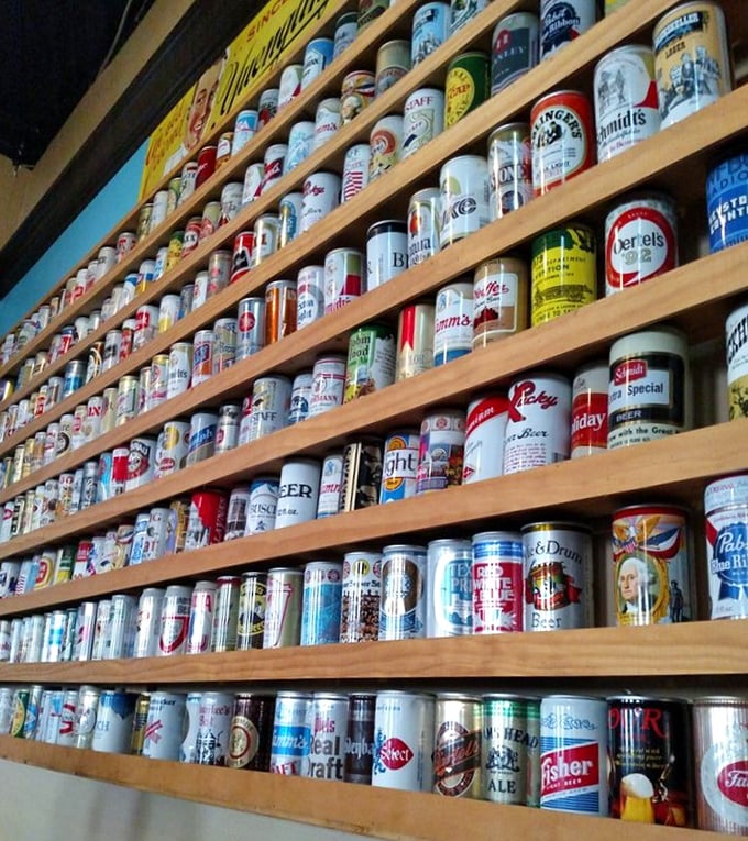 The impressive beer can collection isn't just decoration&mdash;it's a timeline of American brewing history displayed with reverence and style.